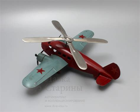 Советская детская механическая игрушка «Самолет СССР