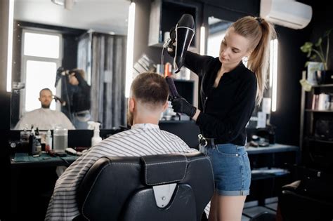 Premium Photo Pretty Barber Girl Cutting Hair