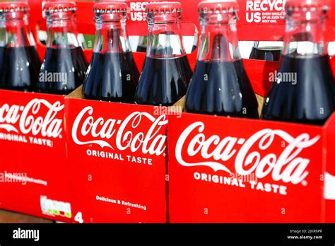 Coke Bottles With Coca Cola Urging To Recycle Bottles Caps And