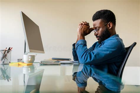 Upset Pensive Black Businessman Sitting At Desk With Computer Male