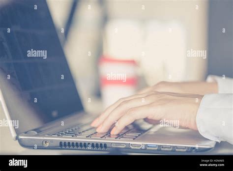 Female Hands Typing On A Laptop Stock Photo Alamy