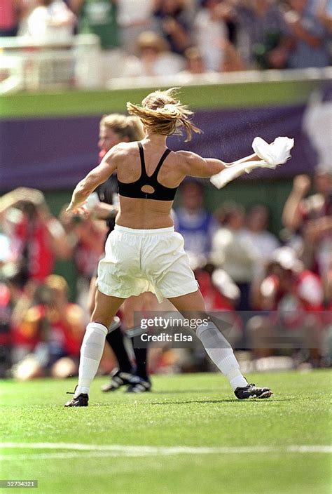 Brandi Chastain Of Team Usa Removes Her Jersey While Celebrating