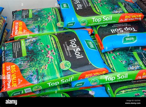 A Stack Of Bags Of Top Soil In A Garden Centre Stock Photo Alamy