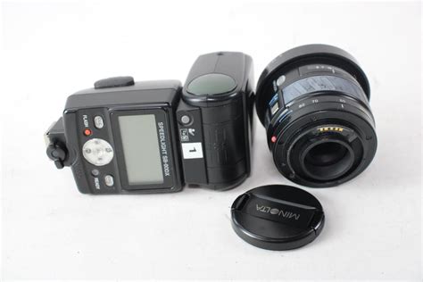Nikon Flash Attachment And Camera Lens 2 Pieces Property Room