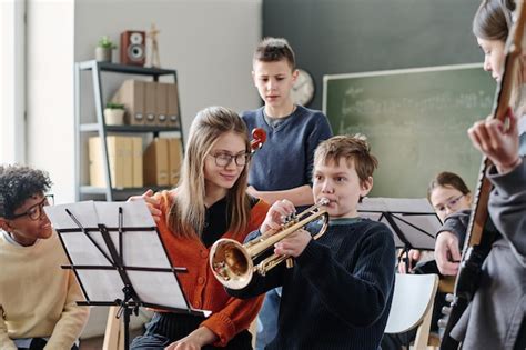 Premium Photo Young Teacher Working With School Orchestra