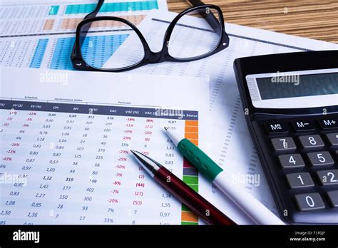 Graphs And Calculator Stock Photo Alamy