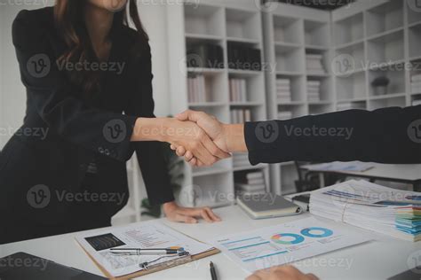 Business Professionals Group Of Young Confident Business People Analyzing Data Using Computer