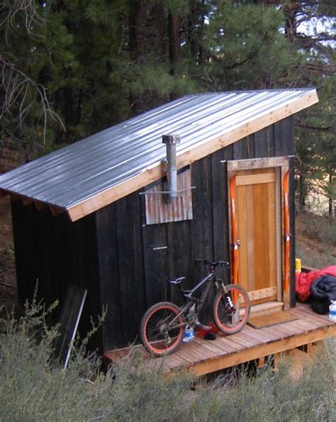 Small Wooden Cabin With Bicycle Backyard Shed Ideas Diy Cabin