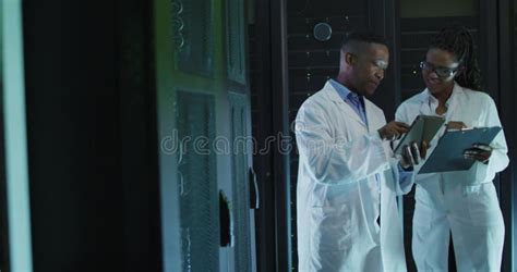 Technicians Using Computers And Tablet In Data Center Implementing Ai Stock Footage Video Of