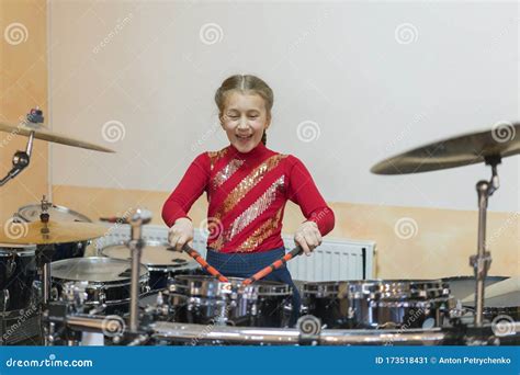 Teen Girl Playing The Drums Teen Girls Are Having Fun Playing Drum