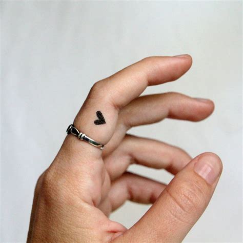 Heart Ring Finger Tattoo