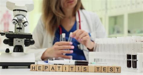 Words Hepatitis Test With Microscope And Blood Samples Stock Footage