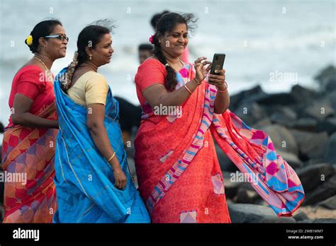 Indian Women In Saris On The Beach Promenade Former French Colony