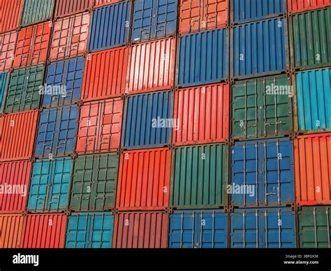 Grid Pattern Of A Tall Stack Of Colorful Cargo Shipping Containers