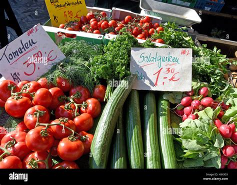 Different vegetables are for sale at a market stall on the weekly ...