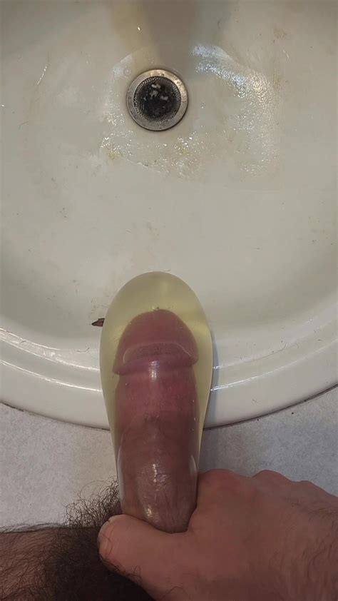Hard Pissing In A Condom ThisVid