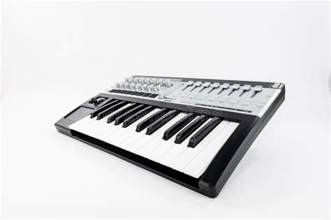Modern Black And White Midi Keyboard With Control Pads In A Studio Setup Stock Image Image Of Modern Black And White Midi Keyboard With Control Pads In A Studio Setup Stock Image Image Of