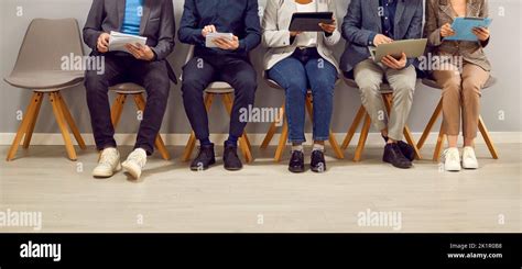people using laptop and tablet computers while waiting for business