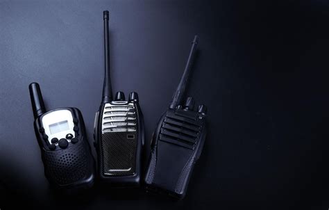 Premium Photo Black Rectangle Portable Device With Antenna Isolated On Black Background Radio