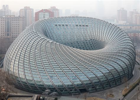 Latticed Shell Encloses Doughnut Shaped Television Studios In Beijing