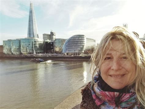 Premium Photo Portrait Of Woman With Gla Building In Background In City