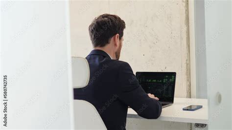 video „programmer dressed in business attire working in an isolated