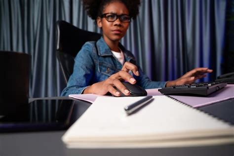 Premium Photo Working African Woman Concentrating Laptop Using Pc For Searching Tastemaker