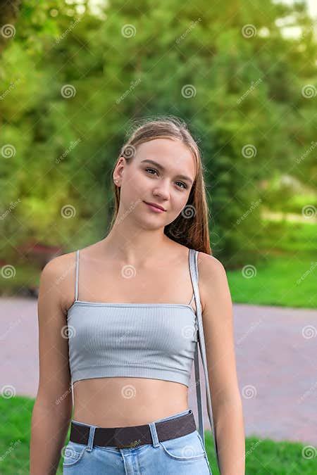 Beautiful Young Girl 16 Years Old With Long Hair In A T Shirt And