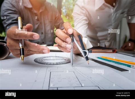 Engineer Or Architect Meeting For Project Working With Partner And