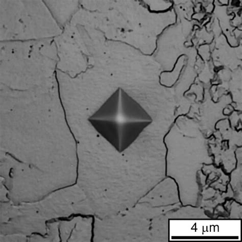 3 Optical Micrograph Of Microhardness Indentation Within Ferrite Grain