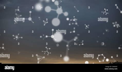 Numerous White Molecular Structures Are Floating Against Dark Cloudy