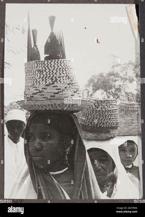 Somalia A Group Of Somali Women Stand With Wicker Baskets On Their