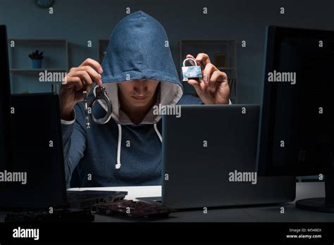 Hacker Hacking Computer At Night Stock Photo Alamy