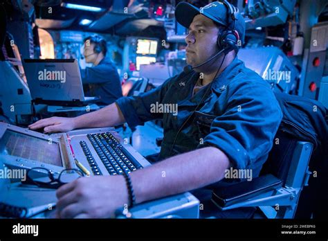 Operations Specialist 2nd Class Stands Surface Warfare Supervisor Watch Aboard The Arleigh Burke