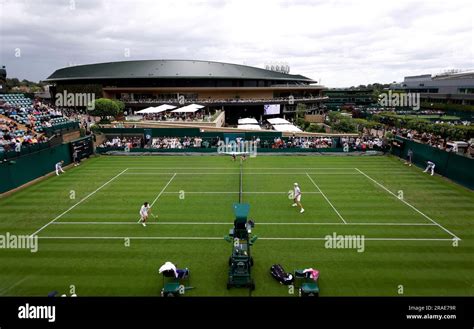 Hubert Hurkacz Right In Action Against Albert Ramos Vinolas Left On
