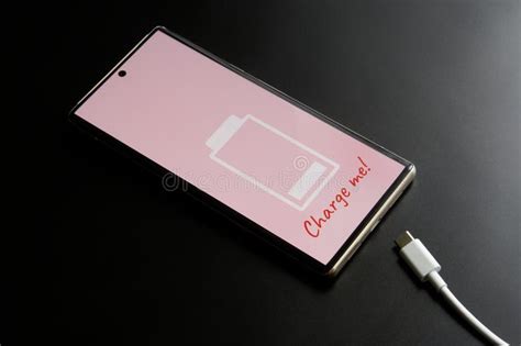 Usb Type C Connector And A Modern Mobile Phone A Smartphone With The Inscription Charge Me