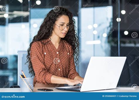 beautiful indian woman programmer web developer focused and confident