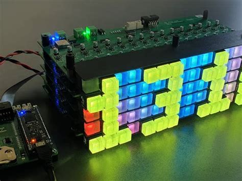 Erich Stygers Moving Pixel Led Clock Pops Its Leds Out To Really Make