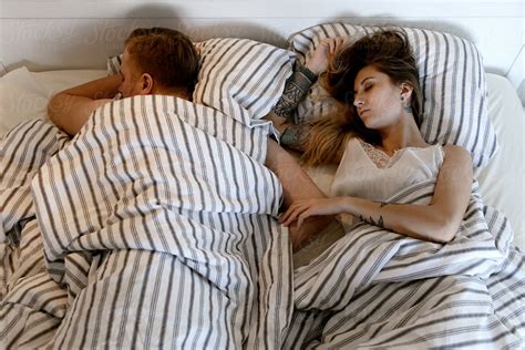 Cute Couple Sleeping Peacefully By Stocksy Contributor Danil Nevsky