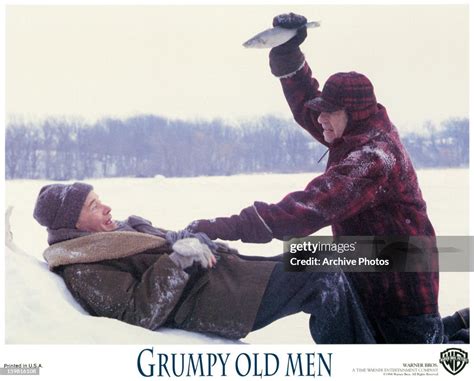 Jack Lemmon Laying On His Back As Walter Matthau Holds Him Down So He