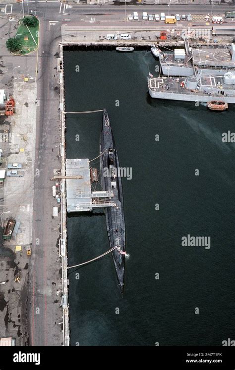 A High Angle View Of The Attack Submarine Uss Darter Ss 576 The Guided Missile Destroyer Uss