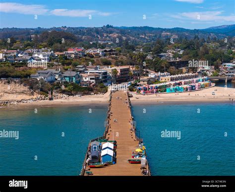 Aerial View Of Capitola Beach With Pier And Colorful Buildings Stock