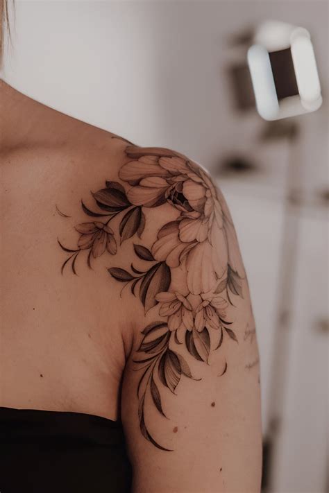 14 Flower Sleeve Tattoo Ideas To Elevate Your Style
