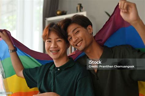 Close Up With Asian Teenage Gay Couples Looking At Camera And Holding