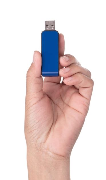Premium Photo Hand Holding Blue USB Flash Memory Isolated On A White Background
