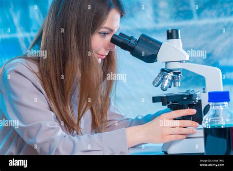 Girl Babe With Microscope In The Laboratory Stock Photo Alamy