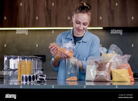 Layout And Sorting Of Food Products Woman Uses Containers To Organize