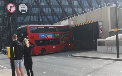 double decker bus crashes into bridge near paddington station