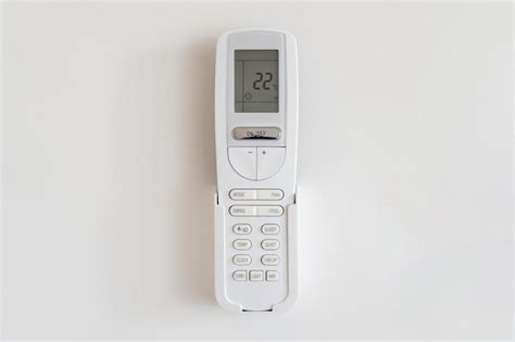 Premium Photo The Air Conditioning Control Panel Mounted On A White Wall Shows The Room