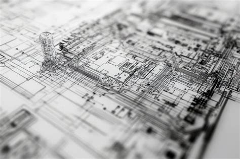 Intricate Blueprint Of An Advanced Electronic Circuit Board With Complex Designs And Components